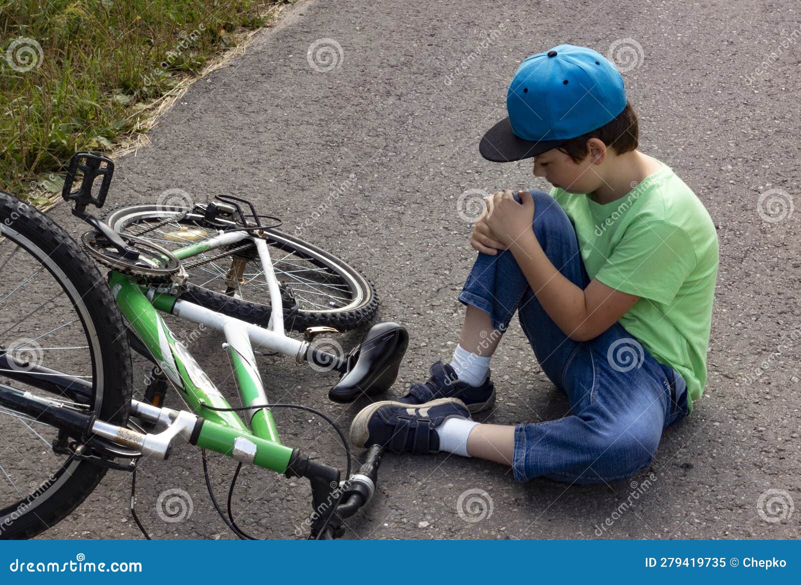 Child Fell Off Bicycle. Boy Keeps Self for Bruised Knee Stock Image ...