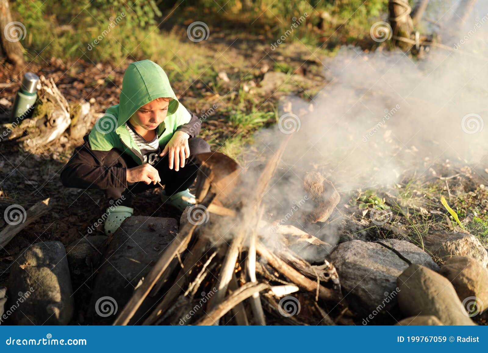 Child by Fire in Forest in Evening Stock Image - Image of relaxation ...