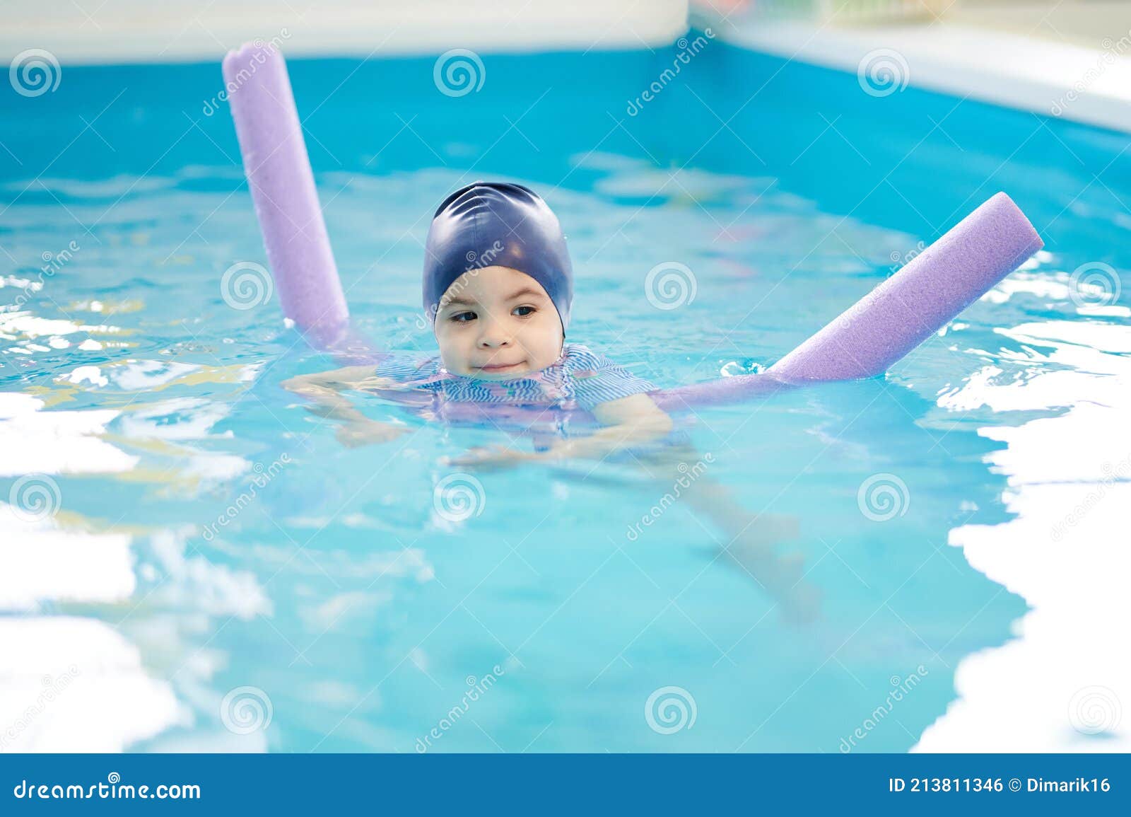 Child float in pool water stock photo. Image of funny - 213811346