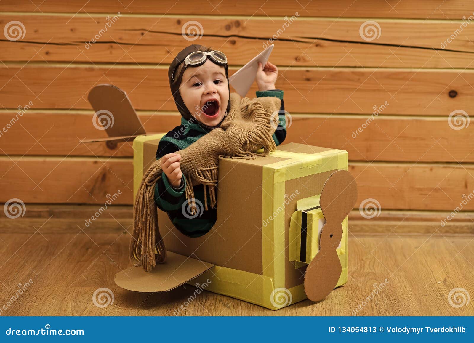 Child is Flying on Hand Made Cardboard Plane. Stock Image - Image of ...