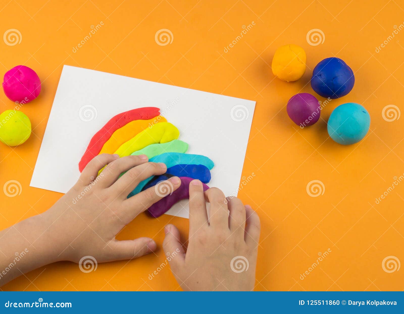 Child Mold from Colored Plasticine.Children`s Hand Stock Photo - Image ...