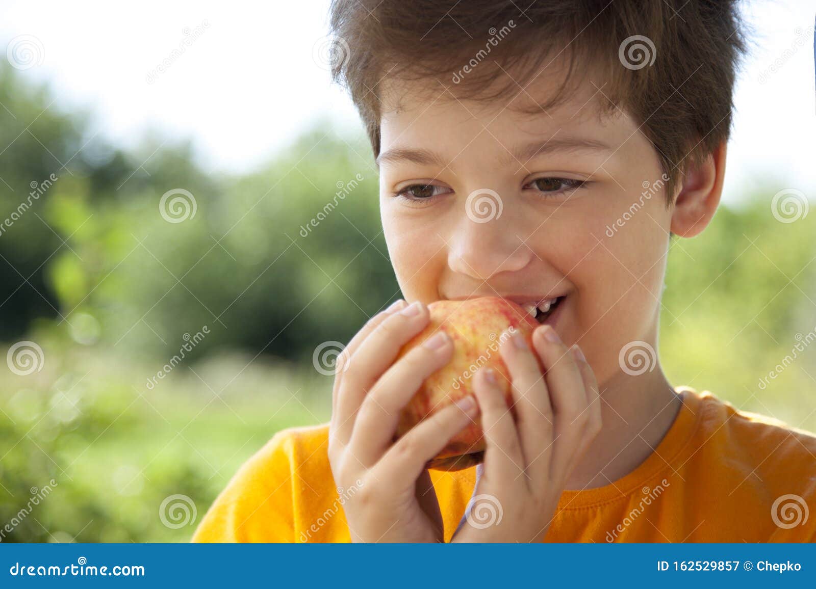 A Child with a Fruit. Kid Eating Fresh Pear Stock Image - Image of ...