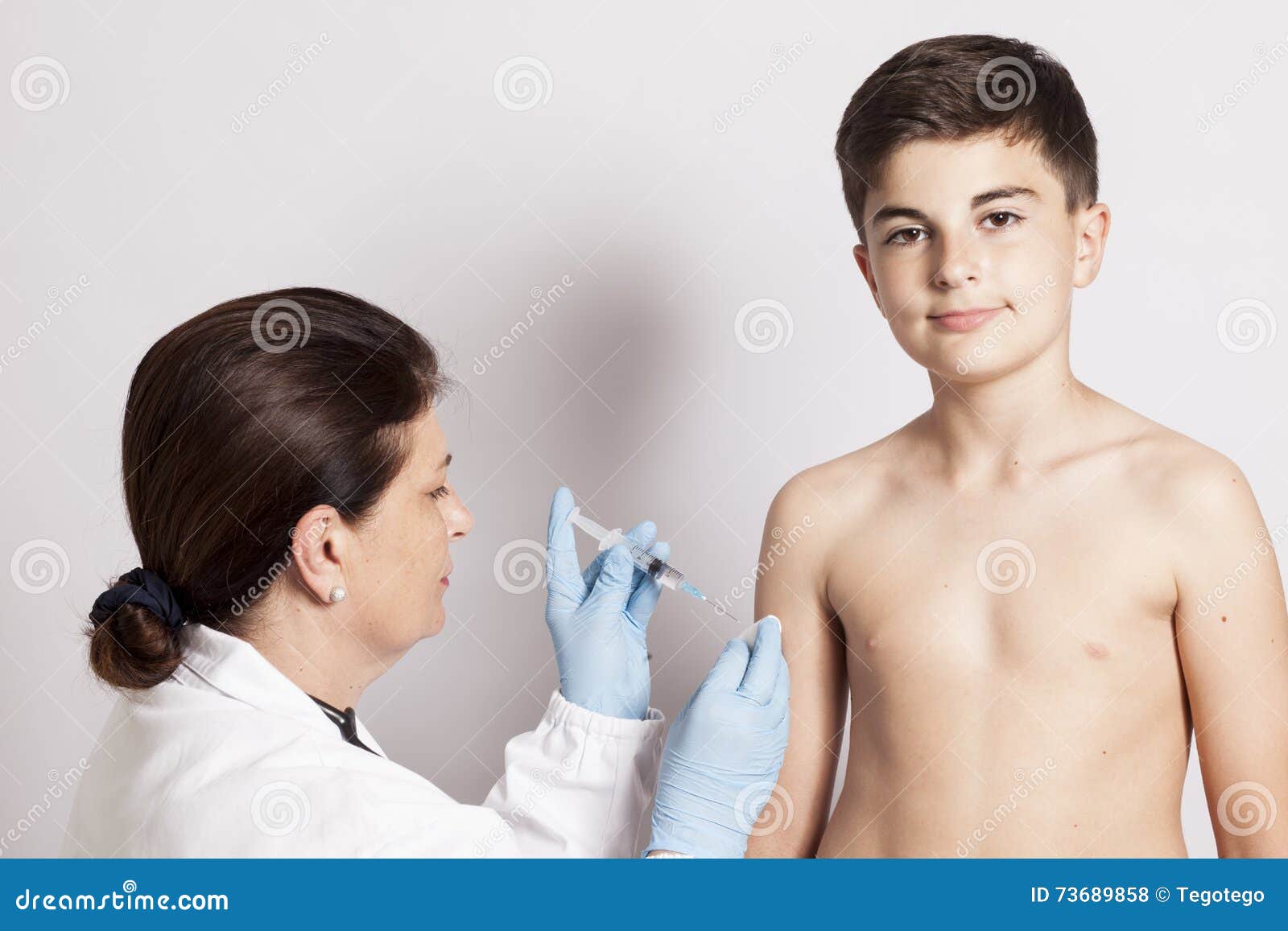 Child getting injection stock photo. Image of people - 73689858