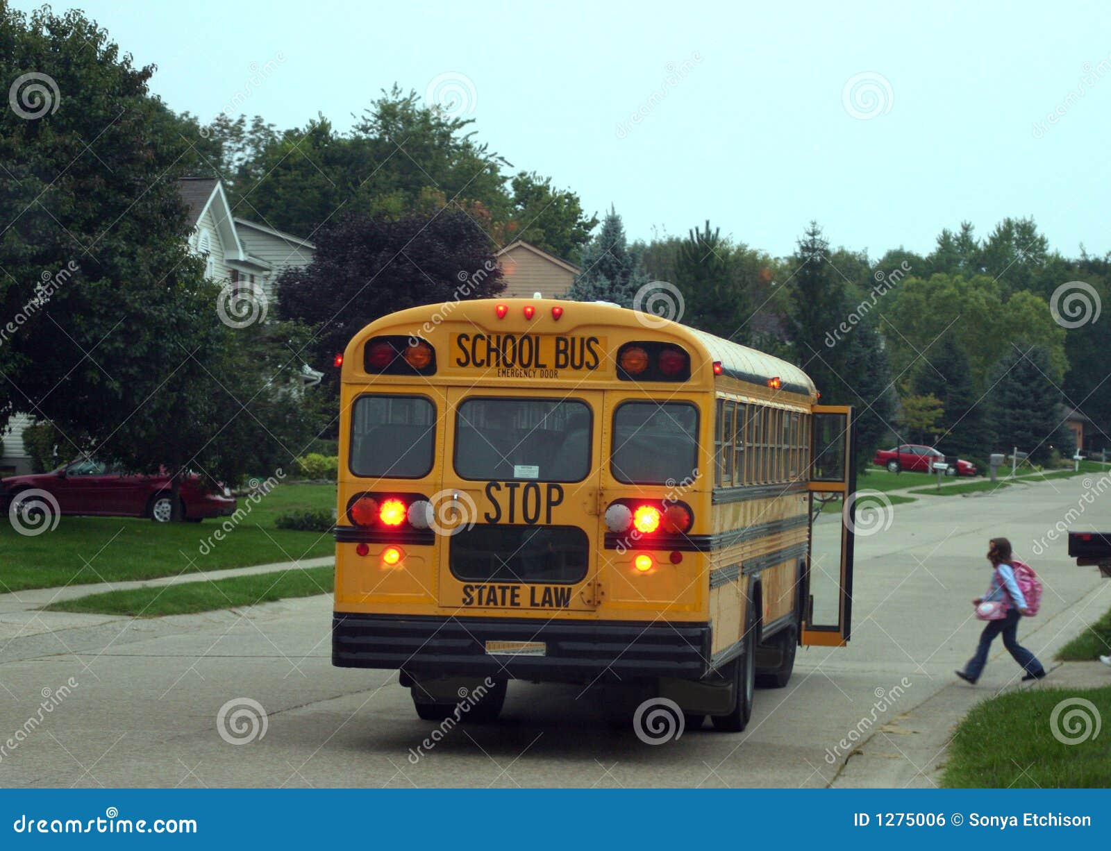 Child Getting on School Bus Stock Photo - Image of student, public: 1275006