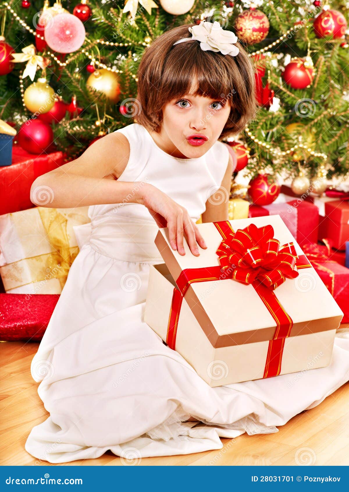 Child with Gift Box Near Christmas Tree. Stock Image - Image of season ...