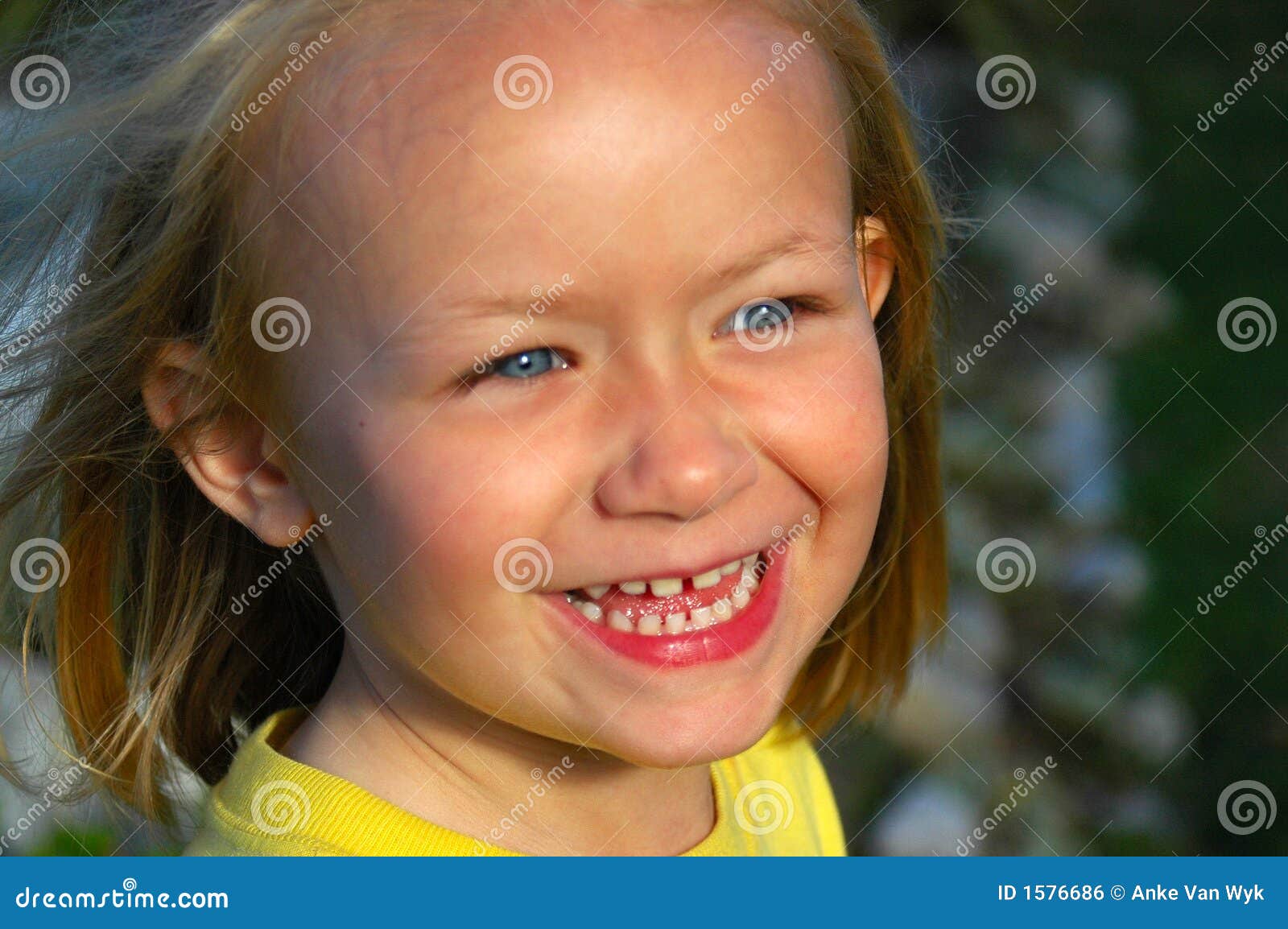 Child giggling stock photo. Image of caucasian, blond - 1576686