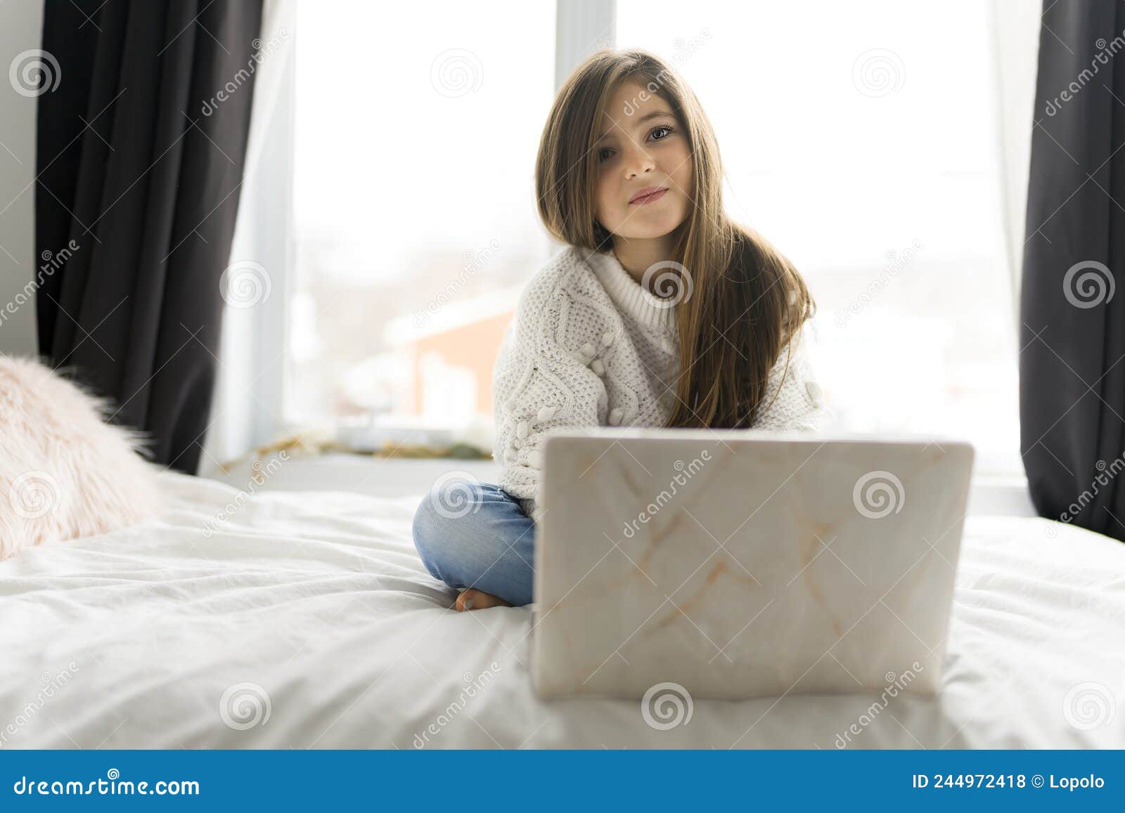 Child Girl with Computers on Bed at Home Stock Photo - Image of home ...