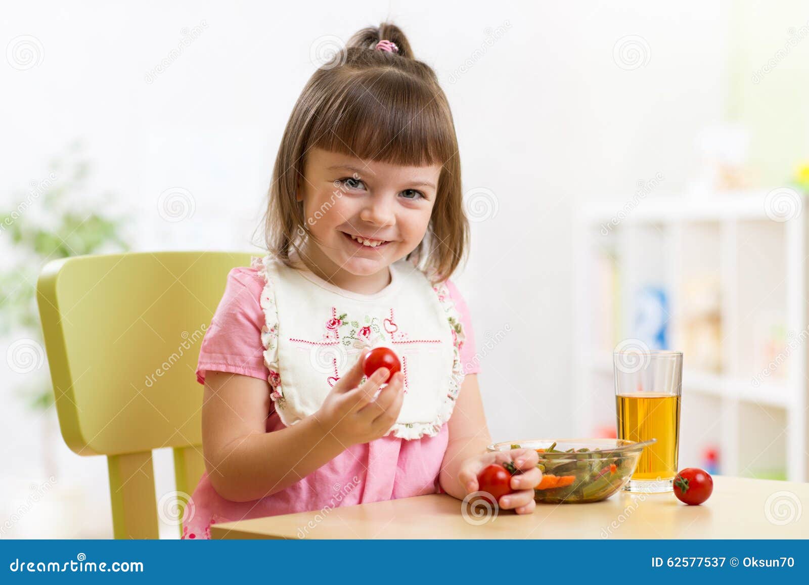 Child Girl Eats Dinner and Shows Tomatoes Stock Image - Image of ...