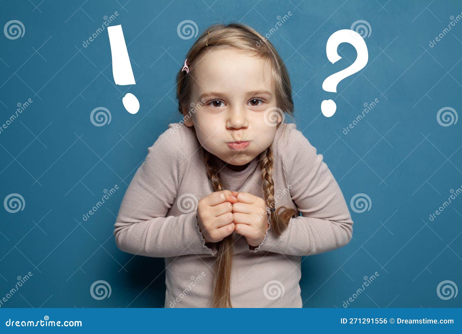 Child Girl with Question and Exclamation Marks on the Background of ...