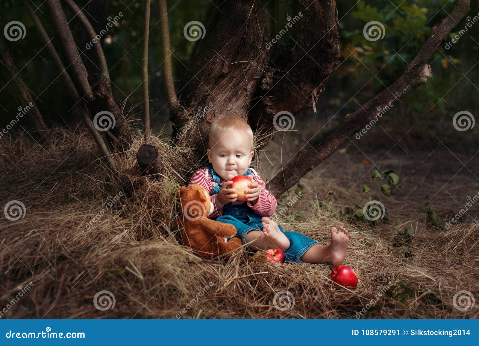 Child Girl Sits Under a Tree. Stock Image - Image of little, childhood ...
