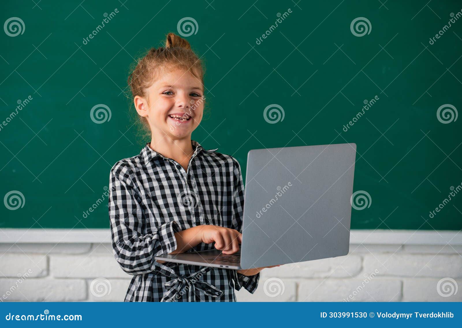 Child Girl Using Gadgets To Study. Computer Education for Kids. Stock ...