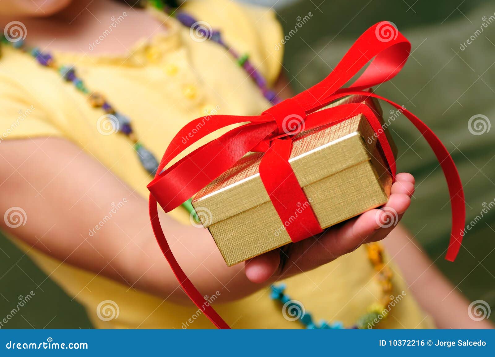 Child Giving Gift stock photo. Image of love, ribbon - 10372216