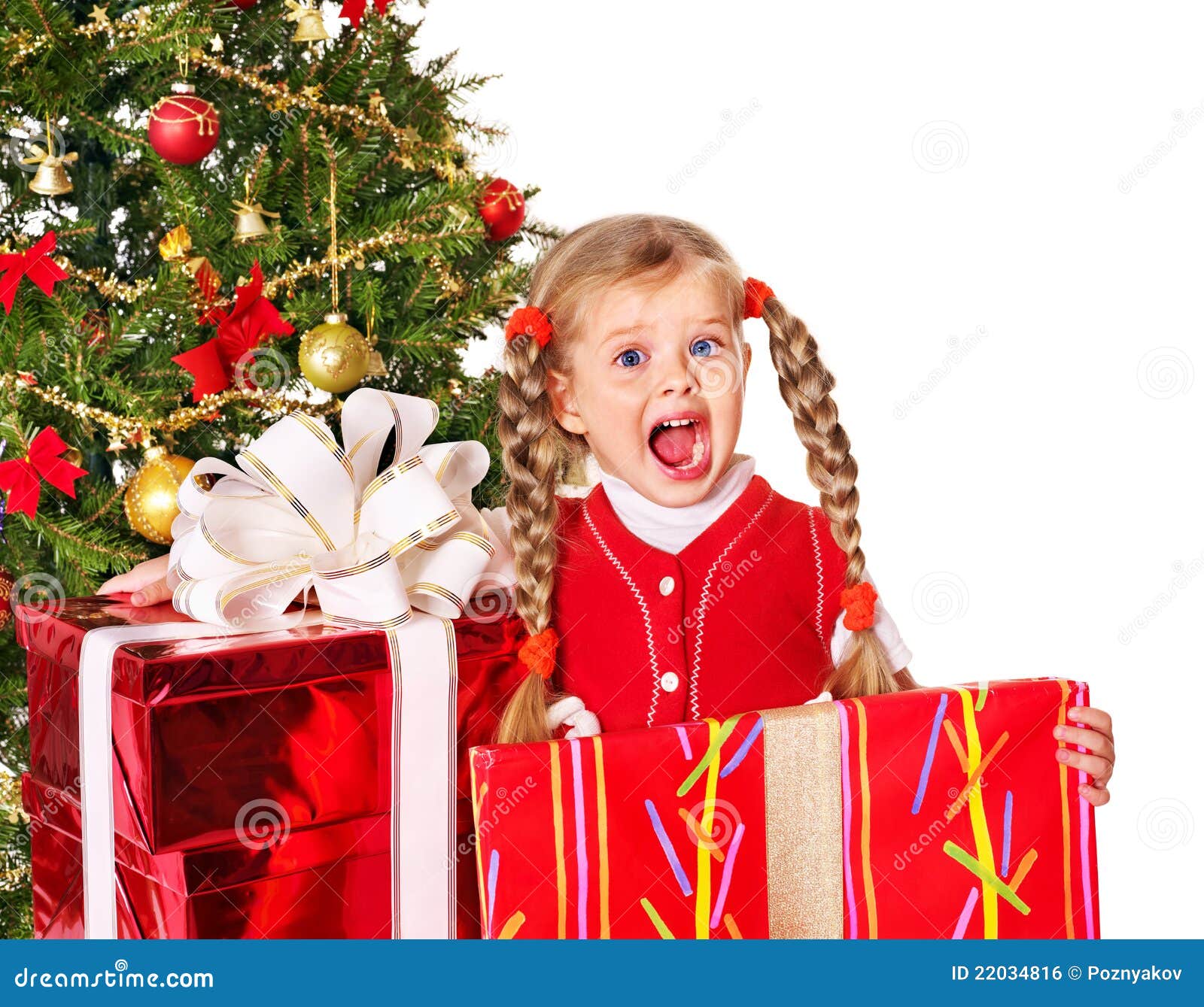 Child Giving Gift Box by Christmas Tree. Stock Photo - Image of child ...