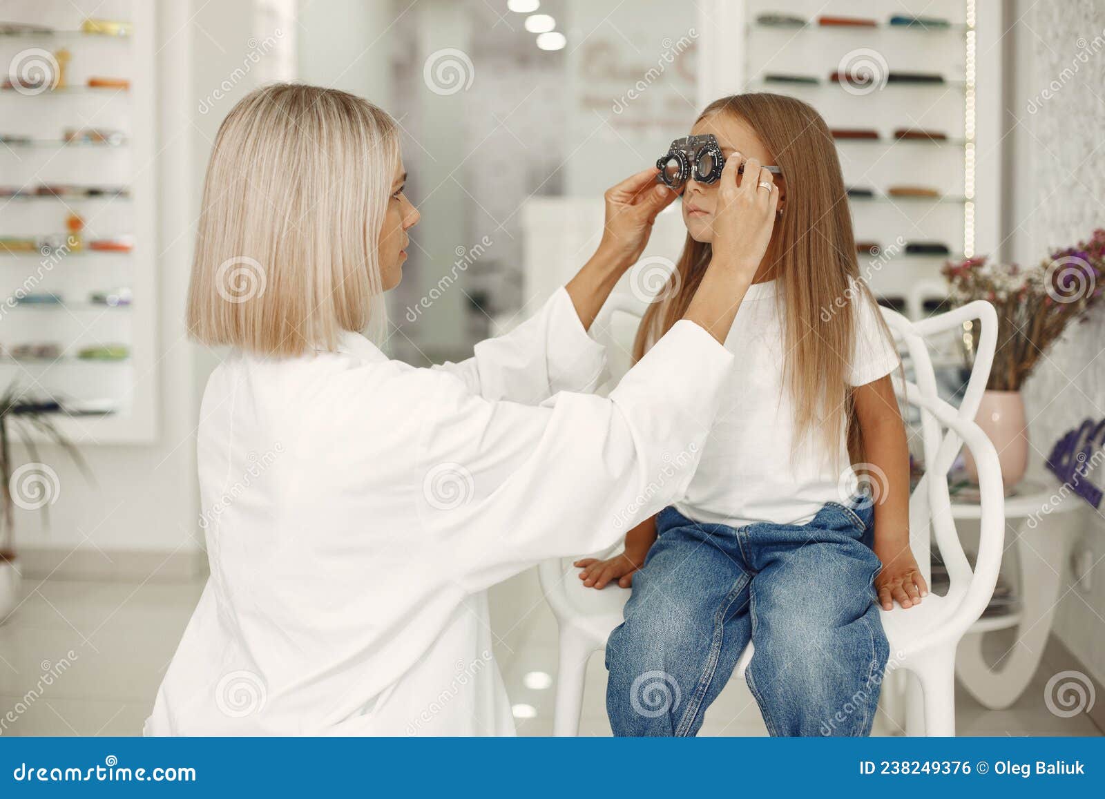 Child in a Glasses Store Check His Eyes Stock Photo - Image of lens ...
