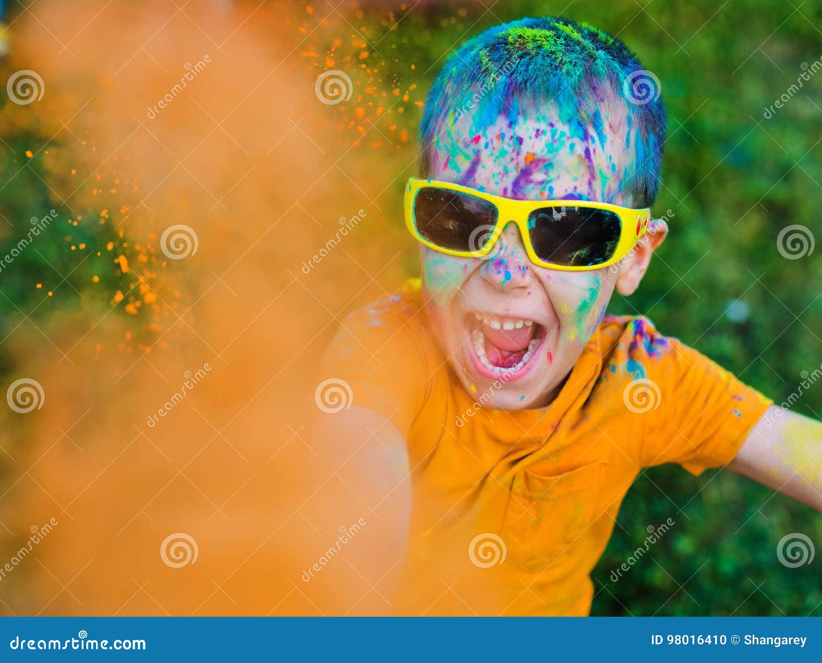 The Child in Glasses Throws Paint Holi Stock Photo - Image of graphic ...