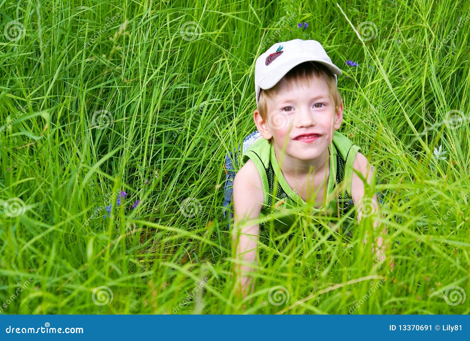 Child in the grass stock image. Image of field, person - 13370691