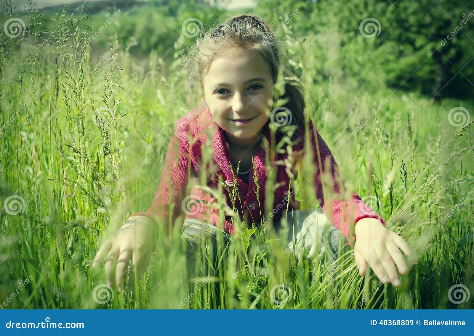 Child on the grass stock image. Image of flower, happiness - 40368809