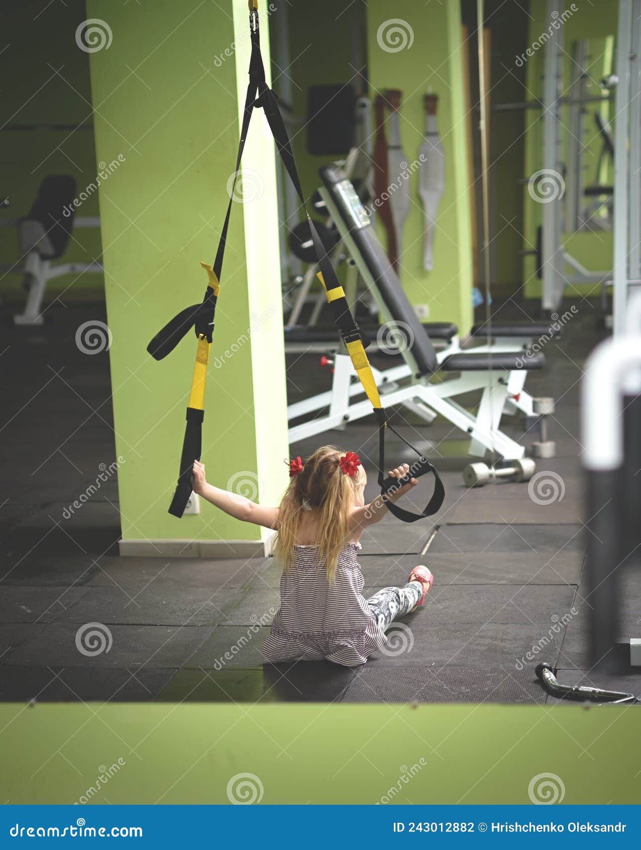 A Child in the Gym Makes an Exercise Stock Photo - Image of child ...