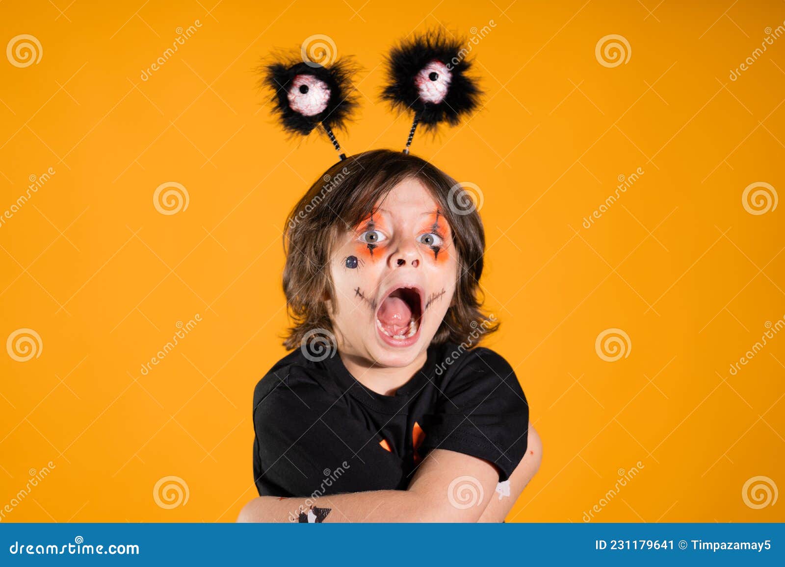 Child with Halloween Donut Doing Poses on Orange Background Stock Image ...
