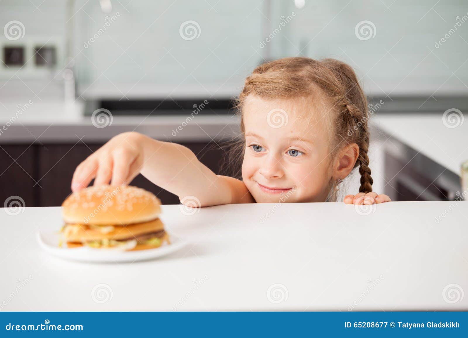 Child with hamburger stock image. Image of secretly, kitchen - 65208677