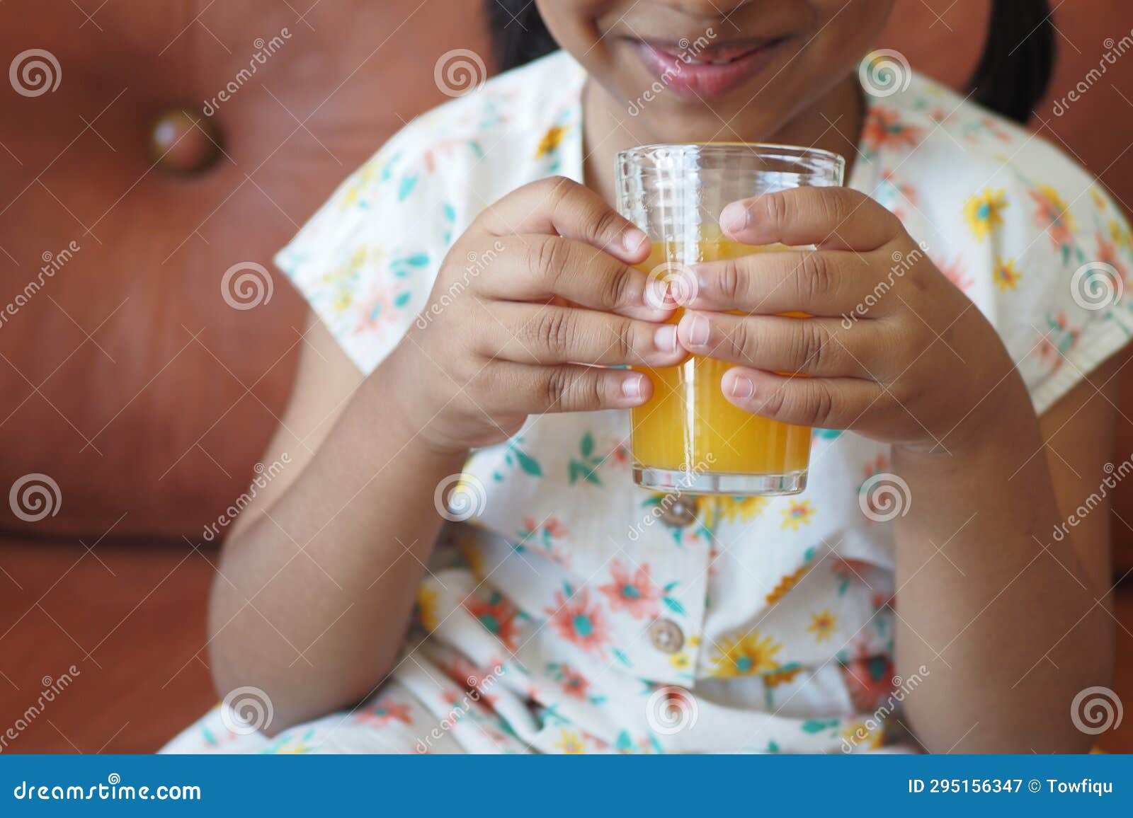 Child Hand Holding a Glass of Orange Juice Stock Image - Image of white ...