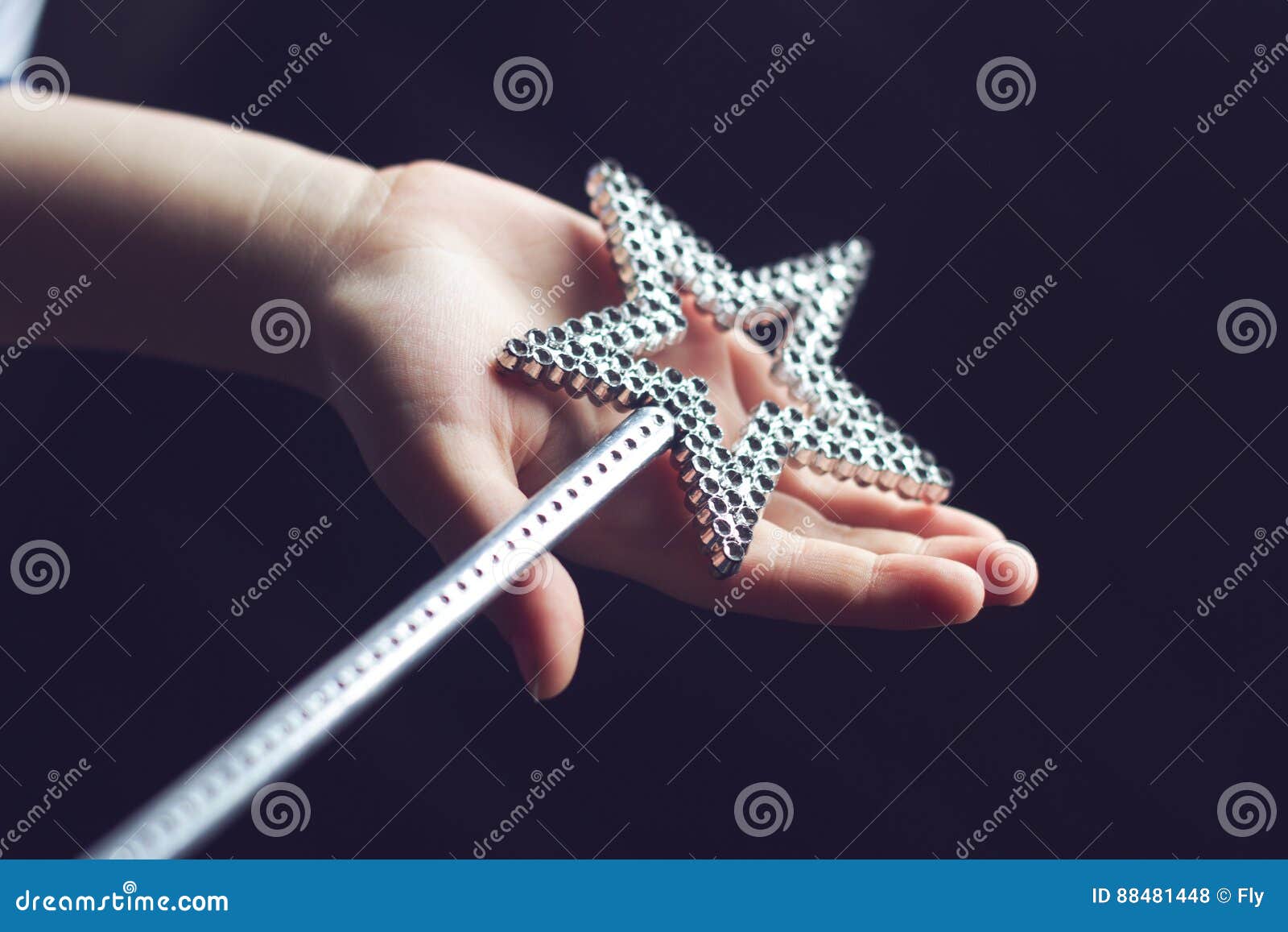 Child Hand Holding a Magic Wand Stock Photo - Image of natural, magic ...