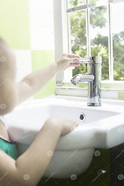 Child hand open tap stock image. Image of environmental - 20725967