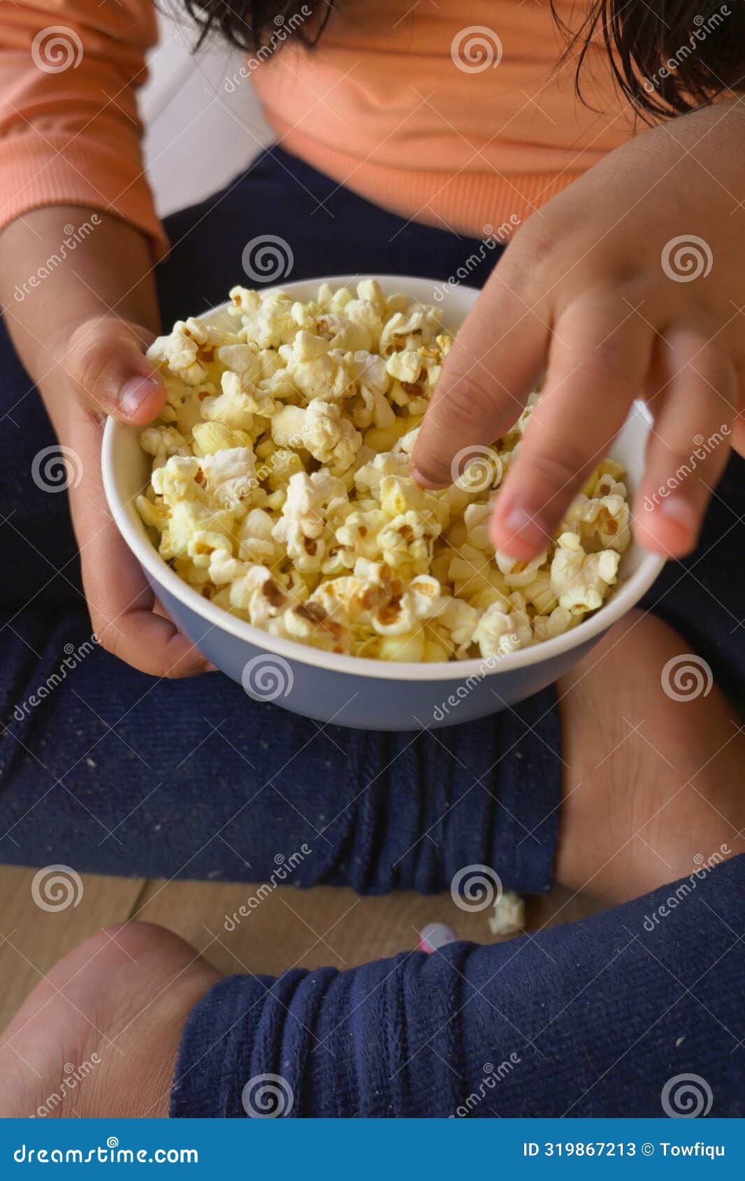 Child Hand Pick Popcorn Sitting on Floor Stock Image - Image of ...