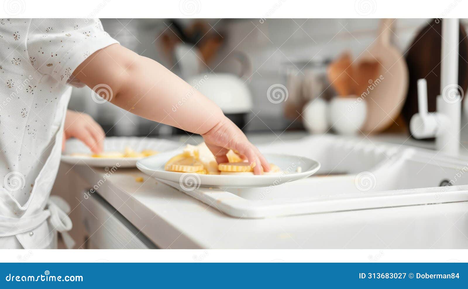 Child Hand Reaching for Dessert in a White Kitchen Scene Stock ...