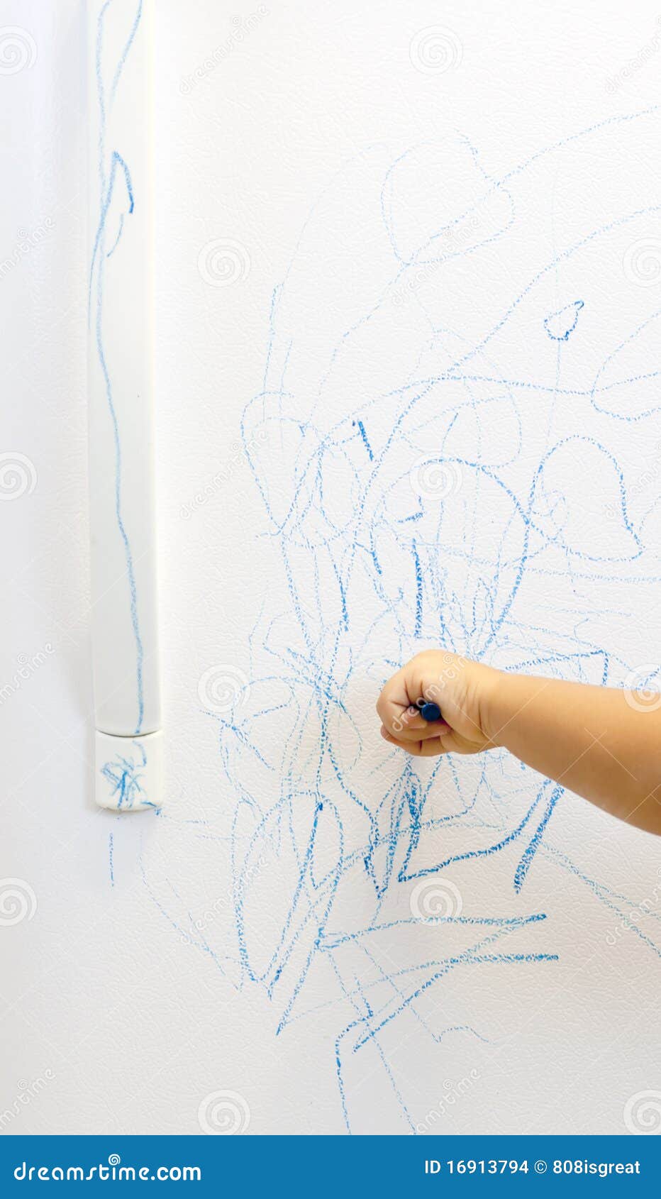 Child Hand Scribbling on Fridge Stock Photo - Image of drawing, blue ...