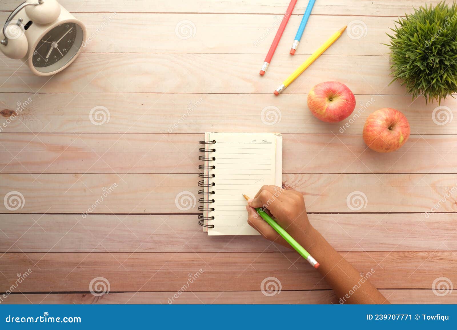 Top View of Child Hand Writing on Notepad on Table Stock Image - Image ...