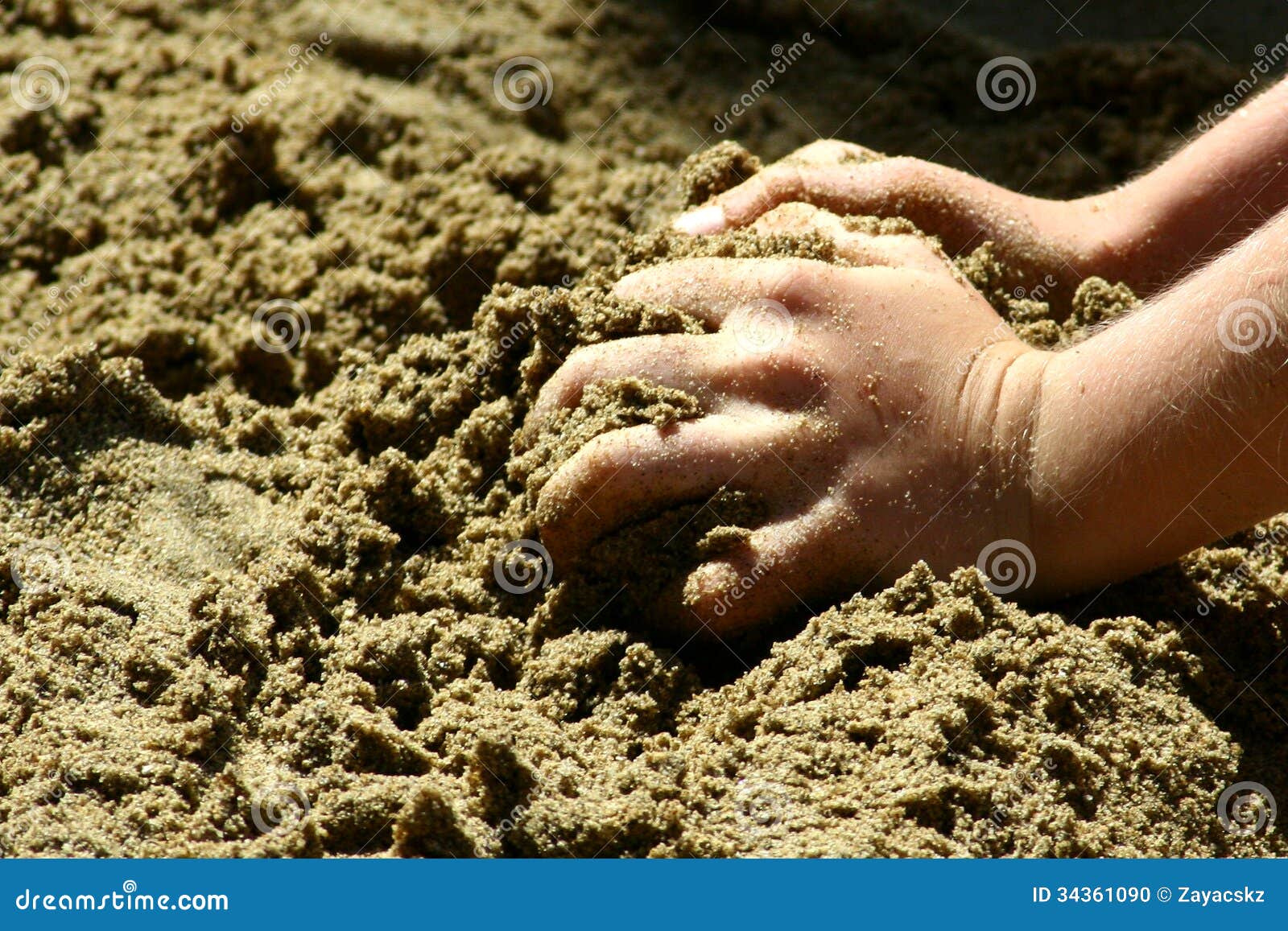 Child Hands Grabbing Sand on a Beach Stock Photo - Image of build ...
