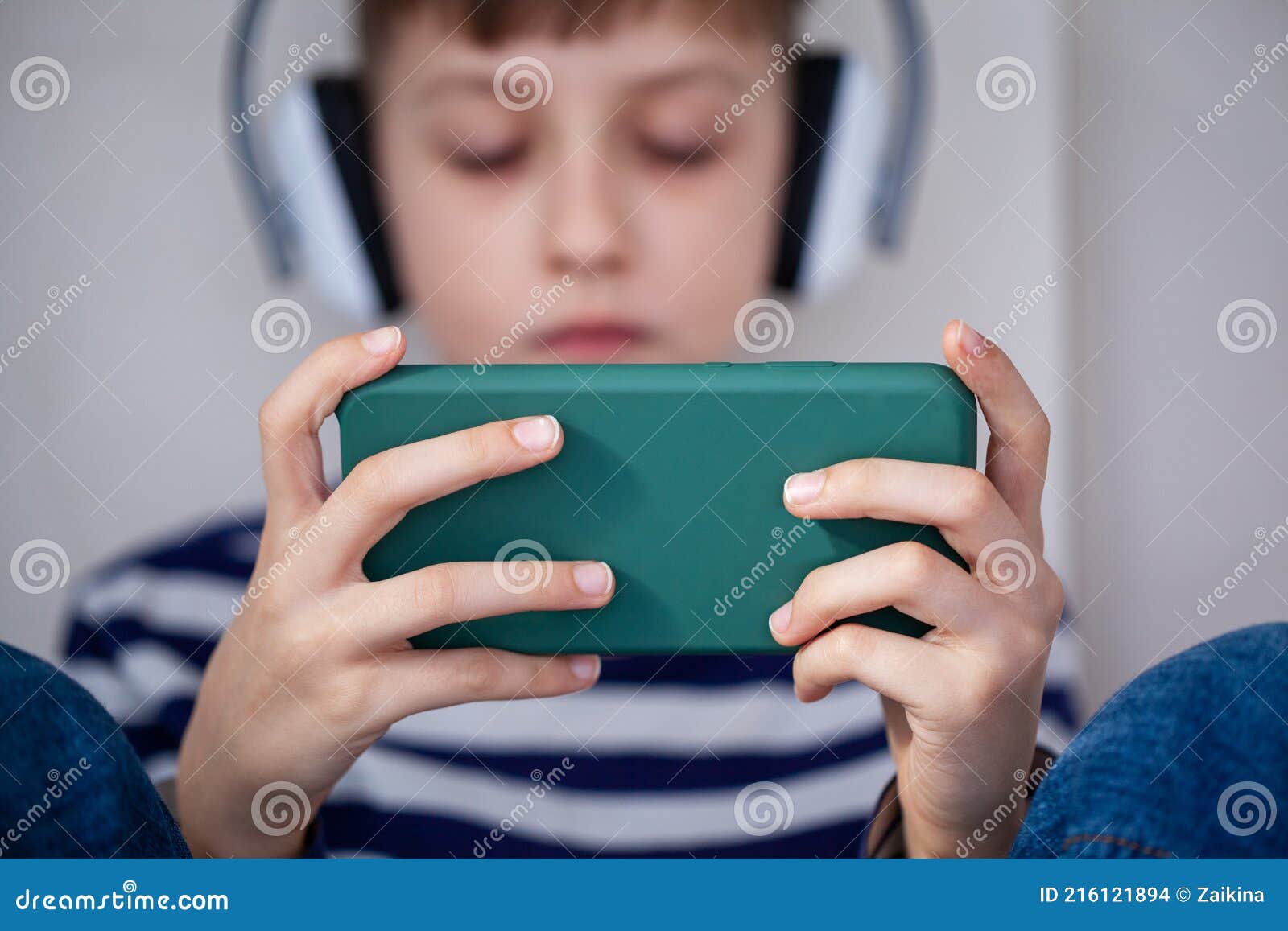 Child Hands Holding Smartphone Close-up for Playing or Learning ...