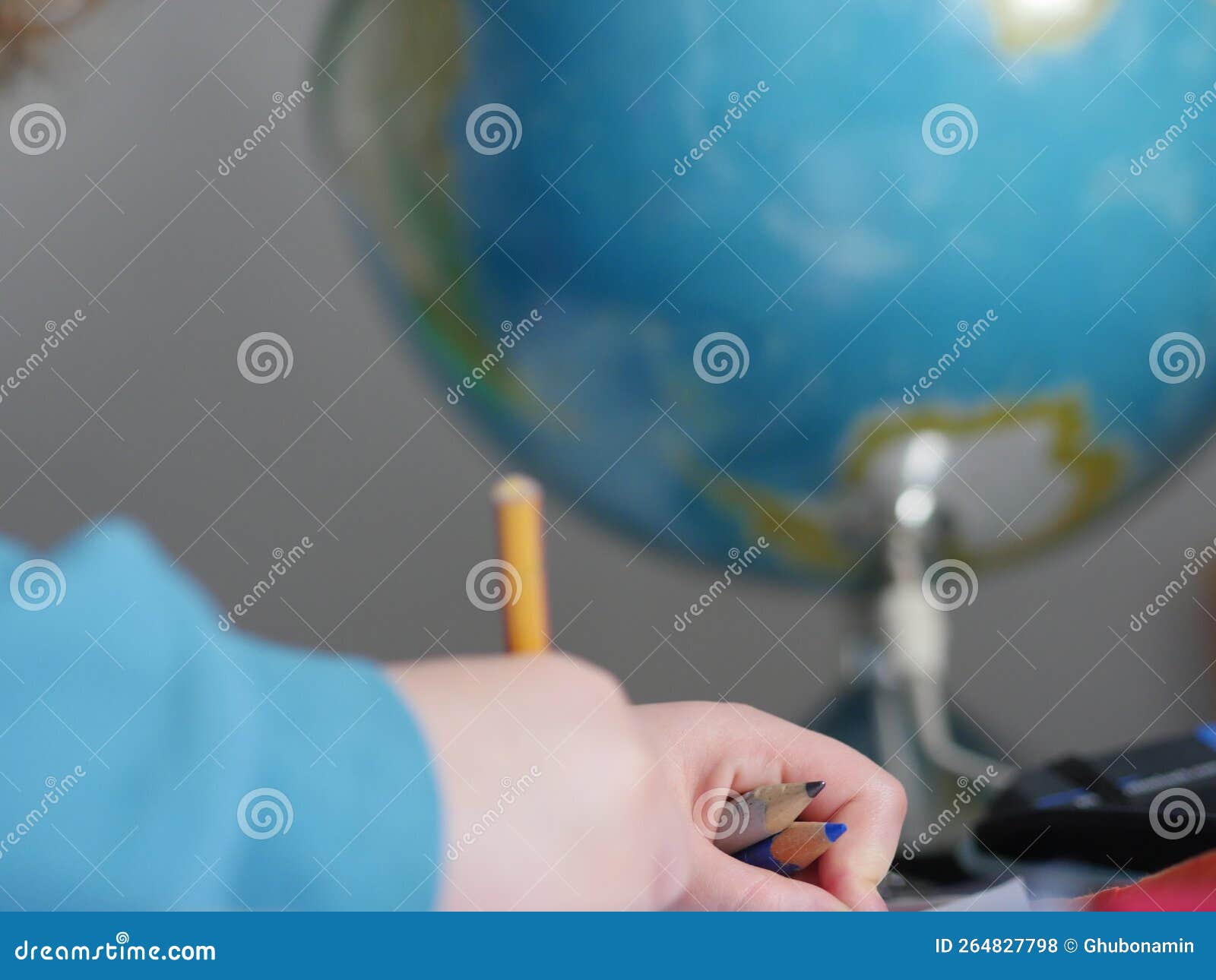 Child Hands Writing in Front of Globe Stock Photo - Image of write ...