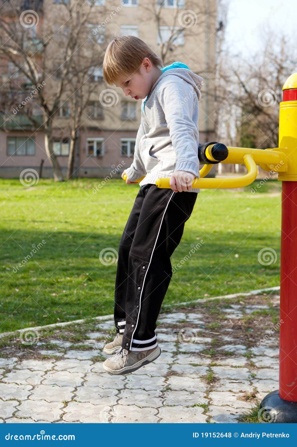 Child hanging on a bars stock photo. Image of innocence - 19152648
