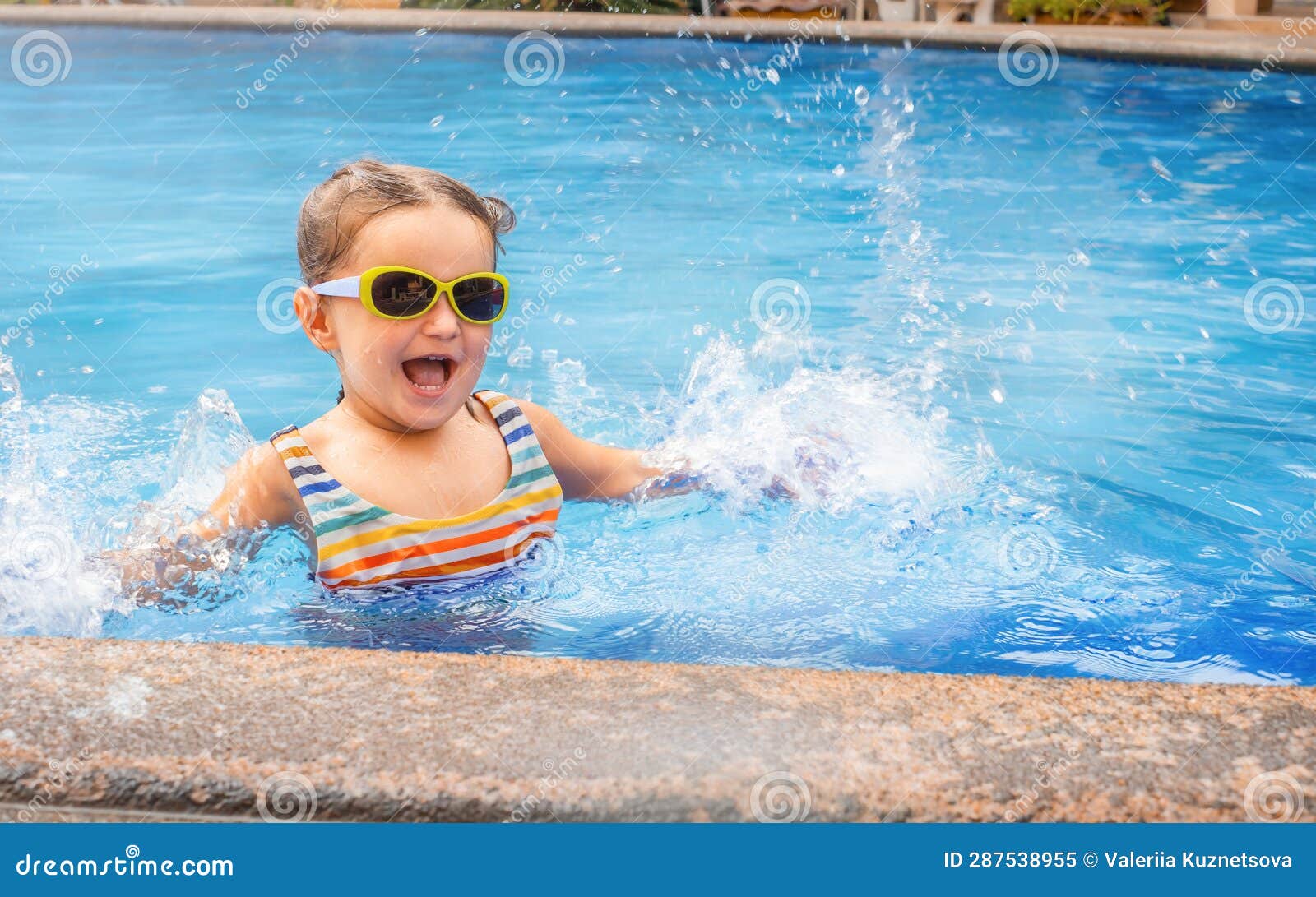 Child Happy Splashing in the Pool with Water Stock Image - Image of ...