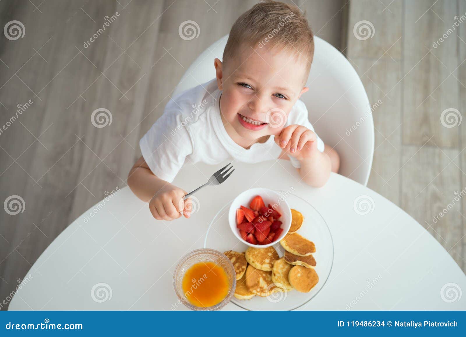 The Child Has Breakfast on a Sunny Morning Stock Photo - Image of home ...