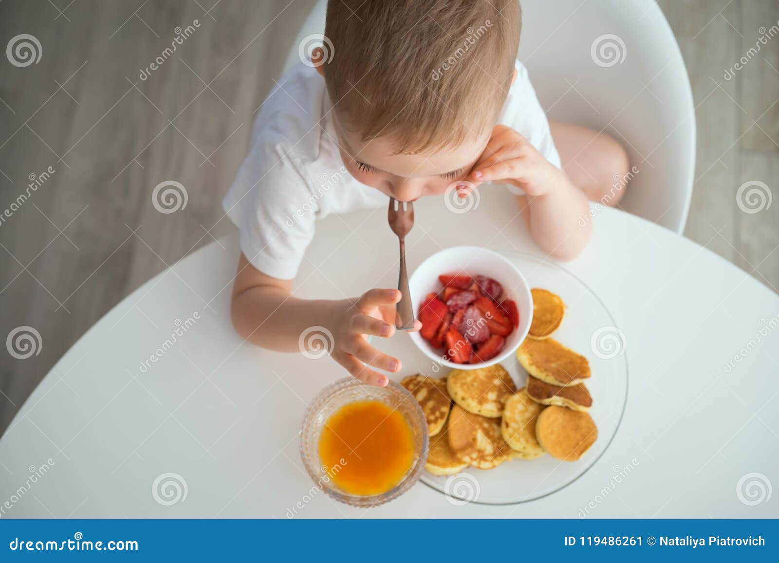 The Child Has Breakfast on a Sunny Morning Stock Image - Image of ...