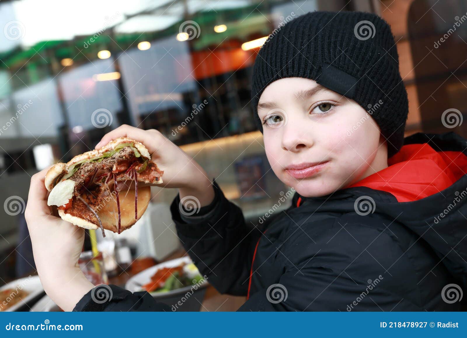 Child Has Burger on Restaurant Terrace Stock Image - Image of breakfast ...