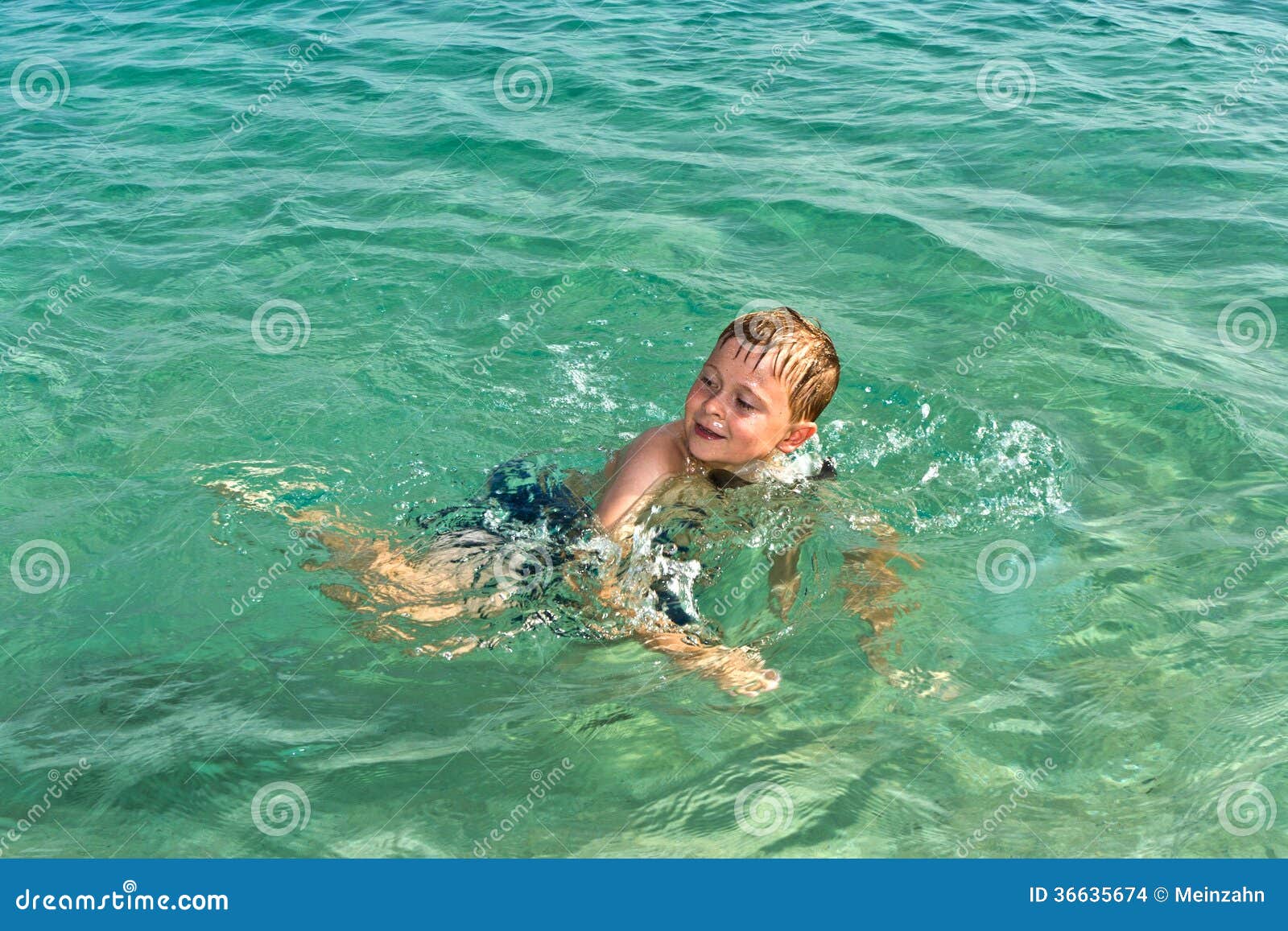 Child has fun in the ocean stock photo. Image of enthusiastic - 36635674