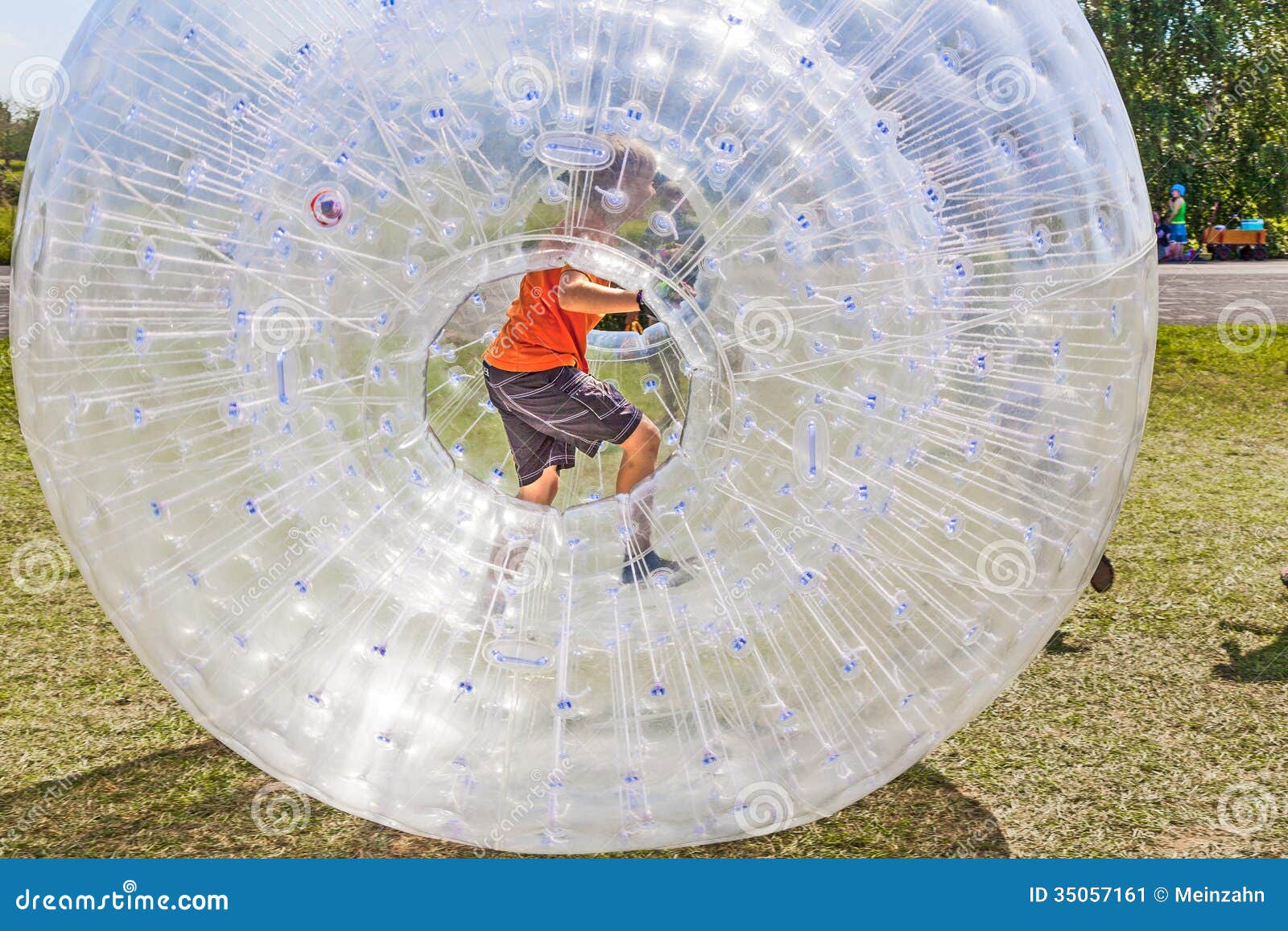 Child Has Fun in the Zorbing Ball Stock Image - Image of activity ...