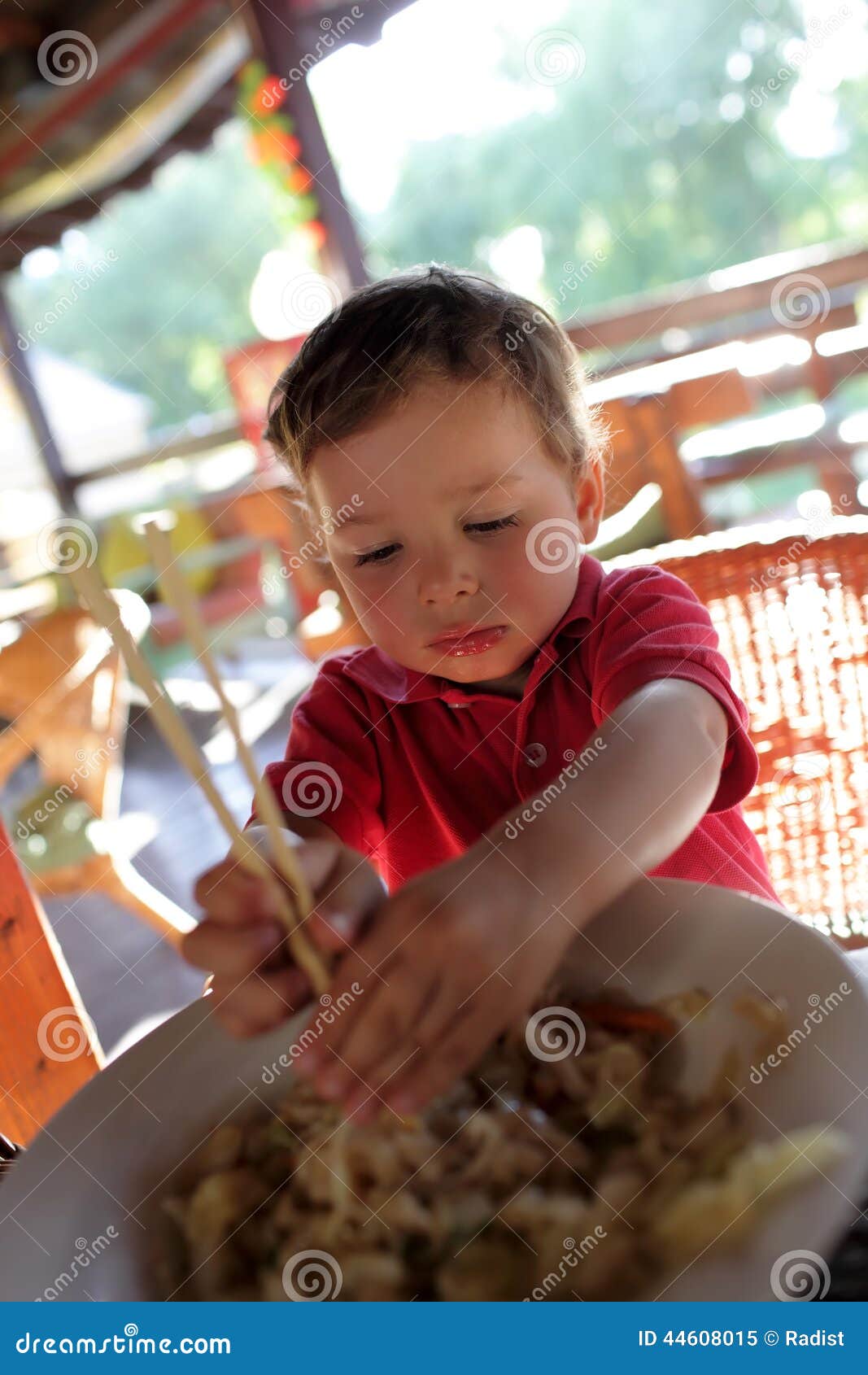 Child has noodles stock image. Image of facial, dinner - 44608015