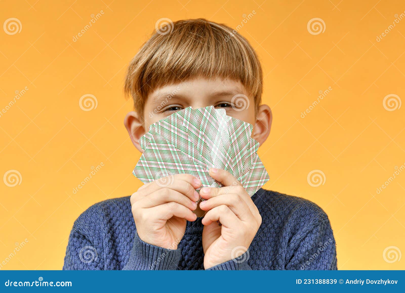 The Child Has Playing Cards in Front of His Face. Gambling Anonymity ...