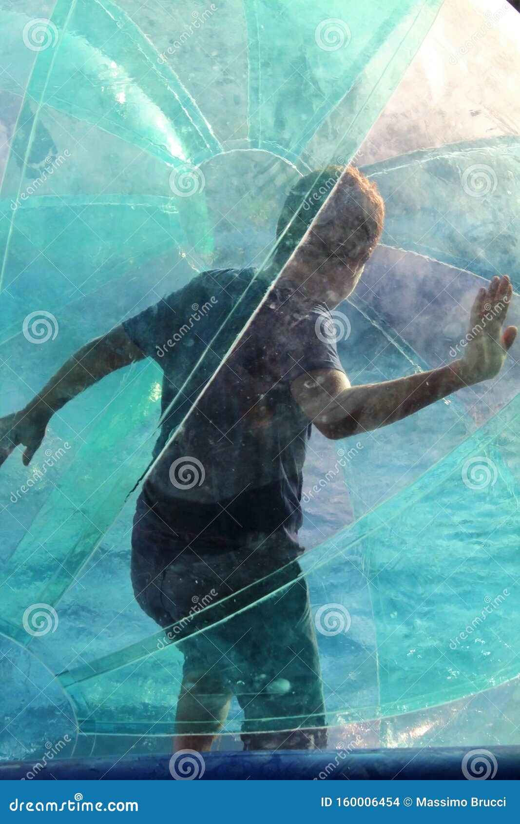 Child Having Fun Inside the Inflatable Ball Floating on the Water in ...