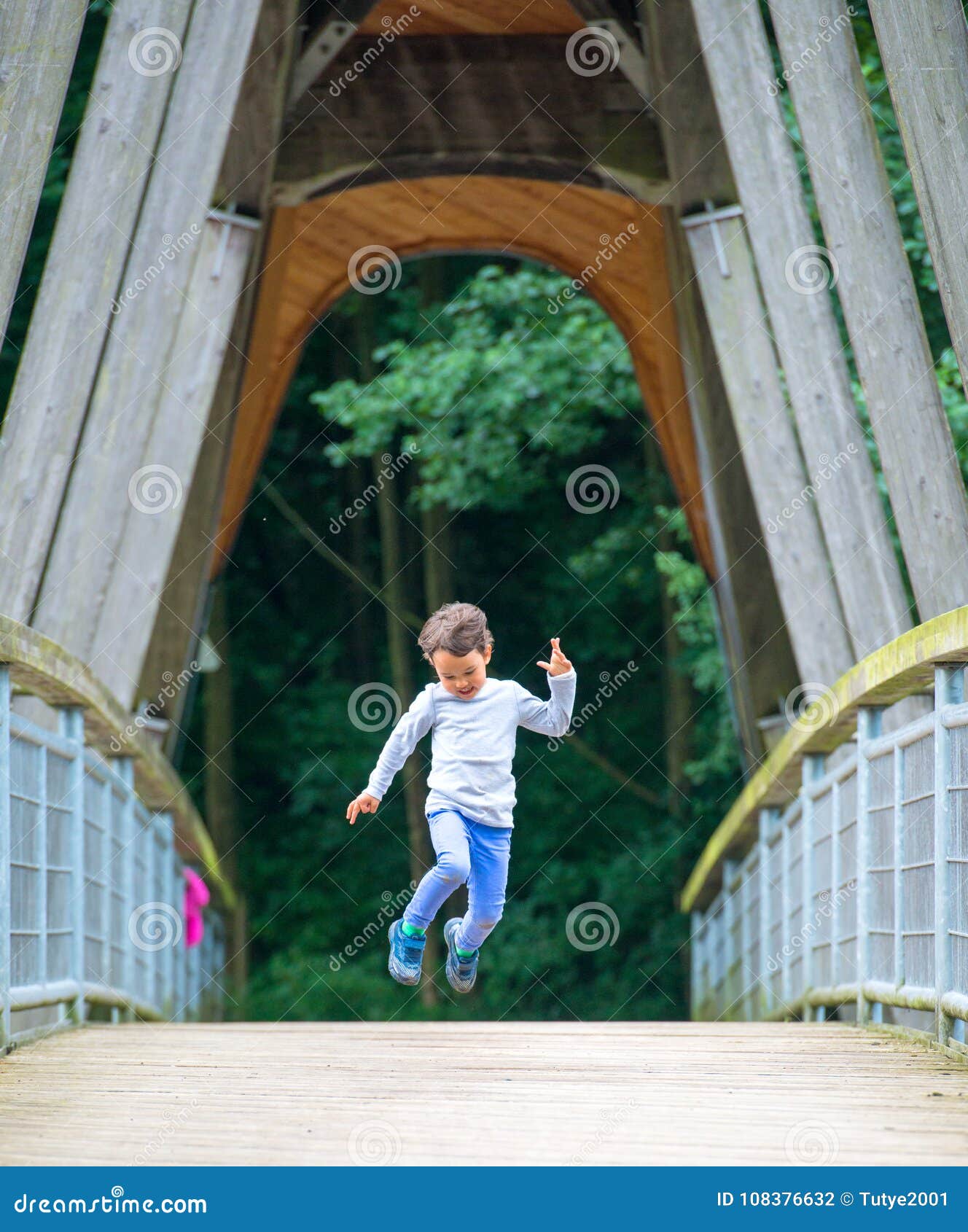 Child Having Fun by Running and Jumping Stock Photo - Image of outside ...