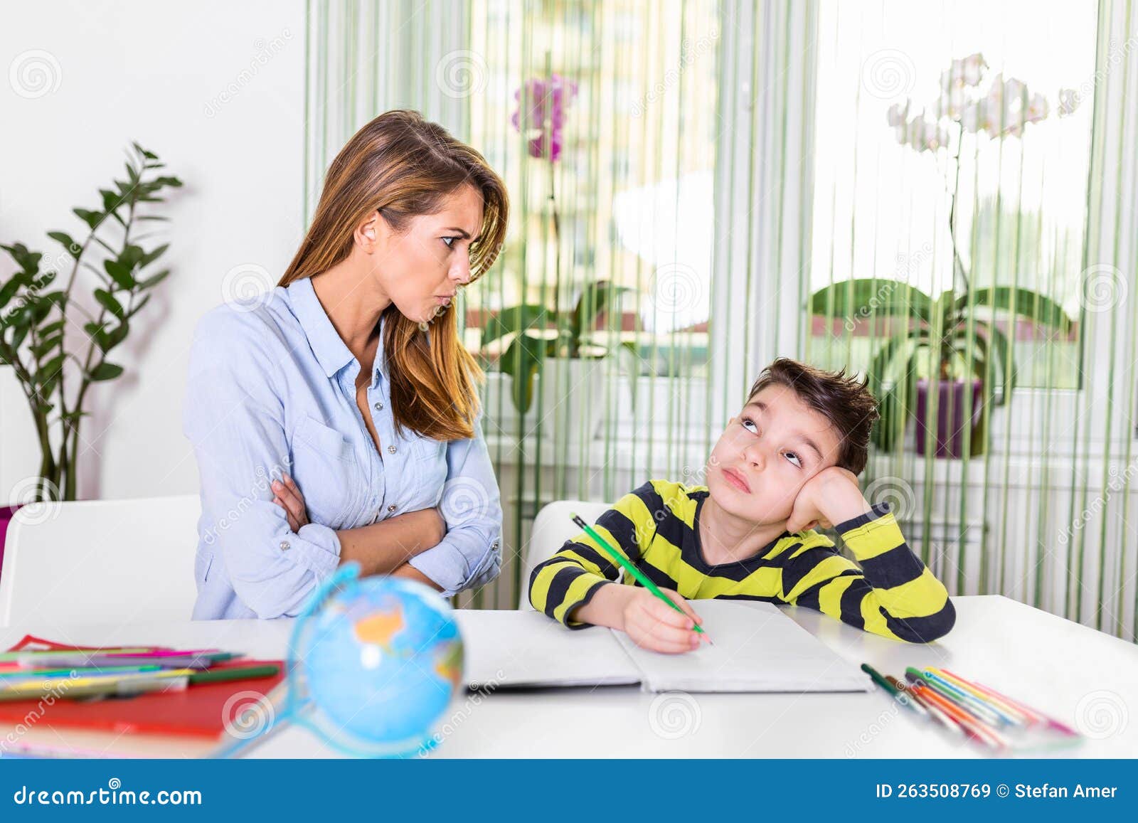 Child Having Problem with Concentration while Doing Homework. Stressed ...