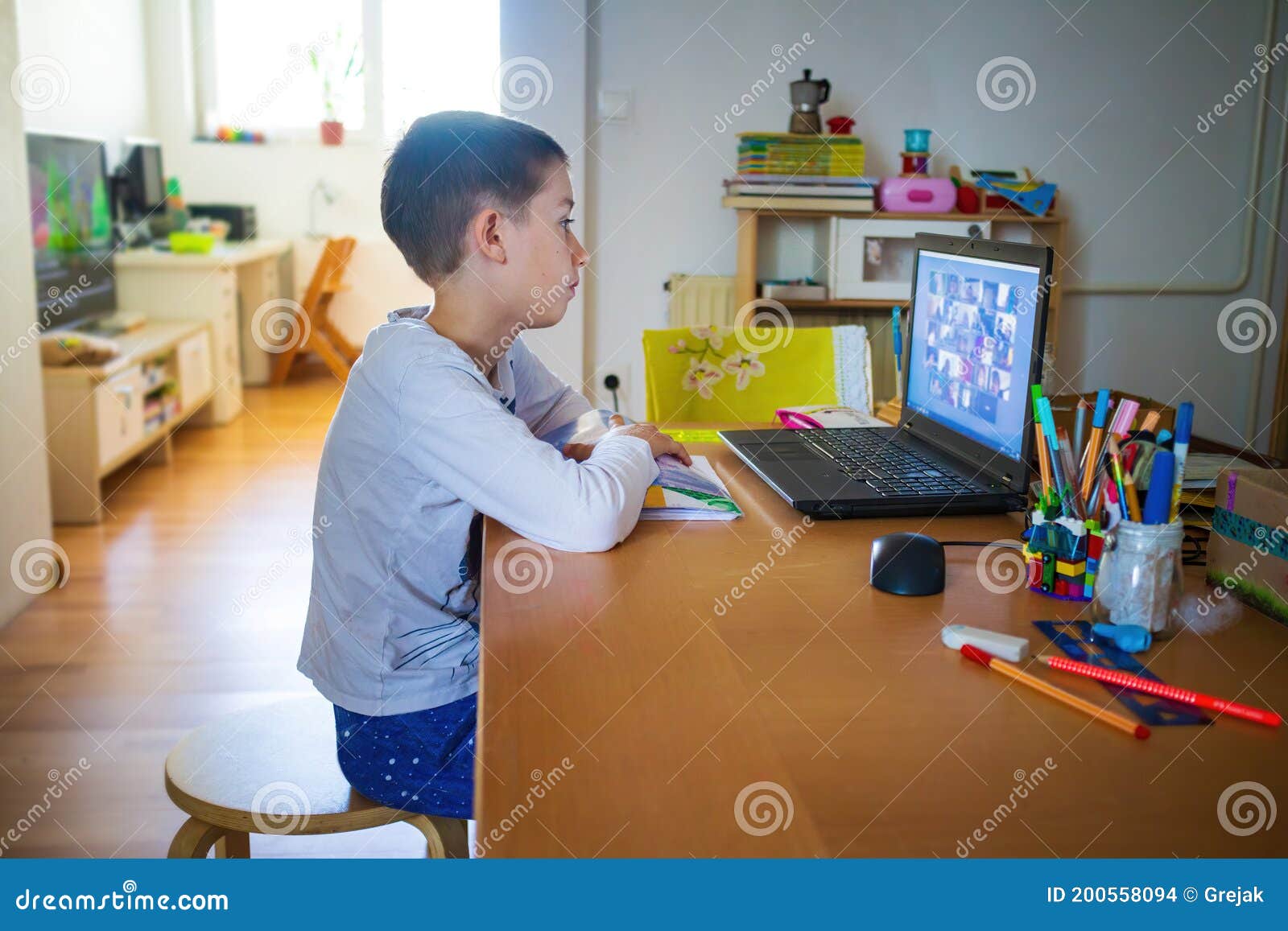 Child having remote school stock photo. Image of homework - 200558094
