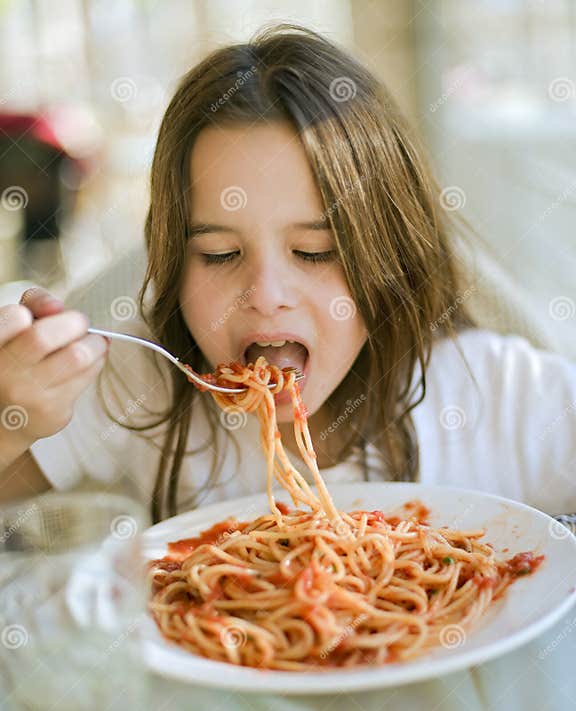 Child having spaghetti stock image. Image of people, dish - 7023461