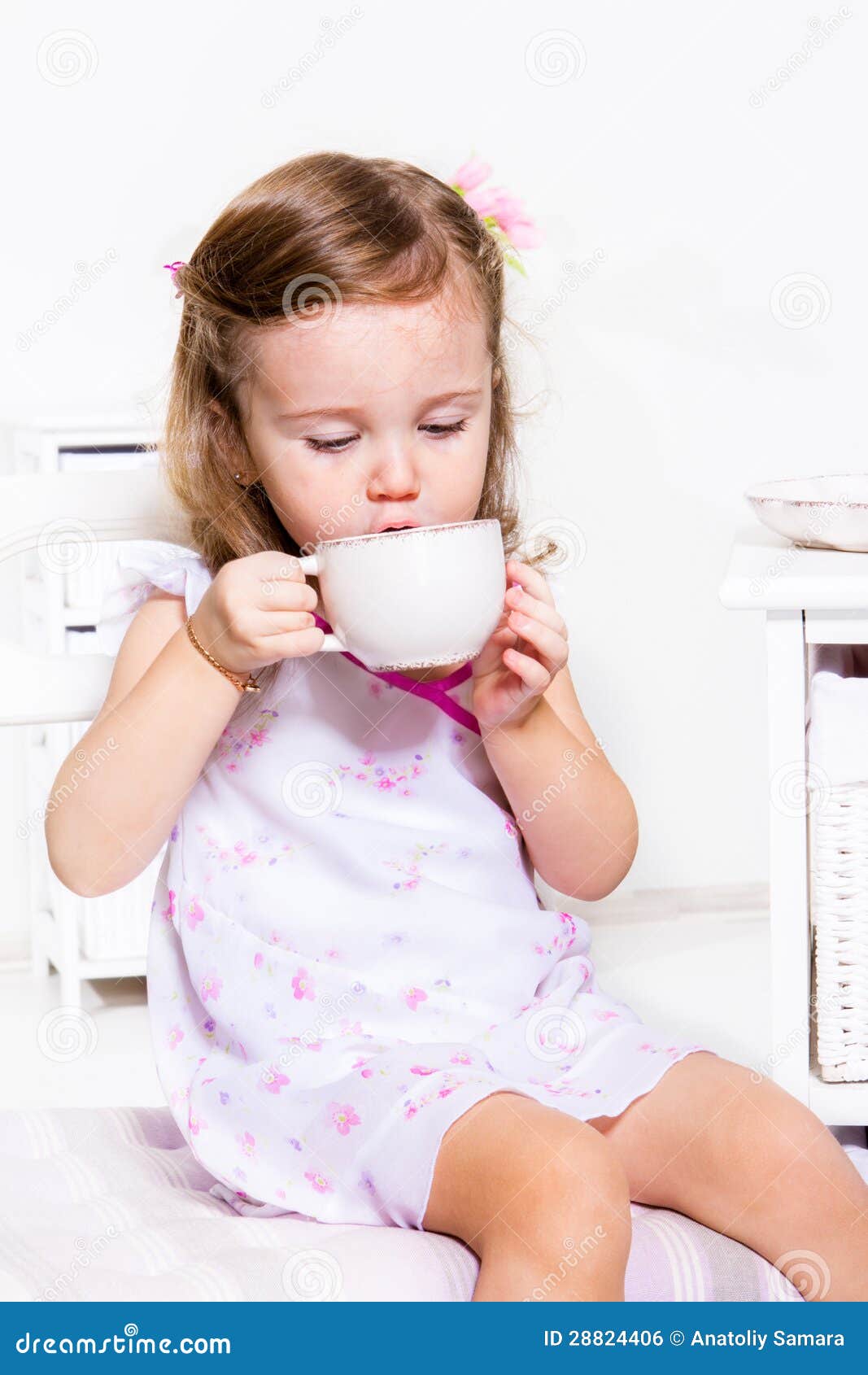 Child having tea stock photo. Image of holding, chair - 28824406