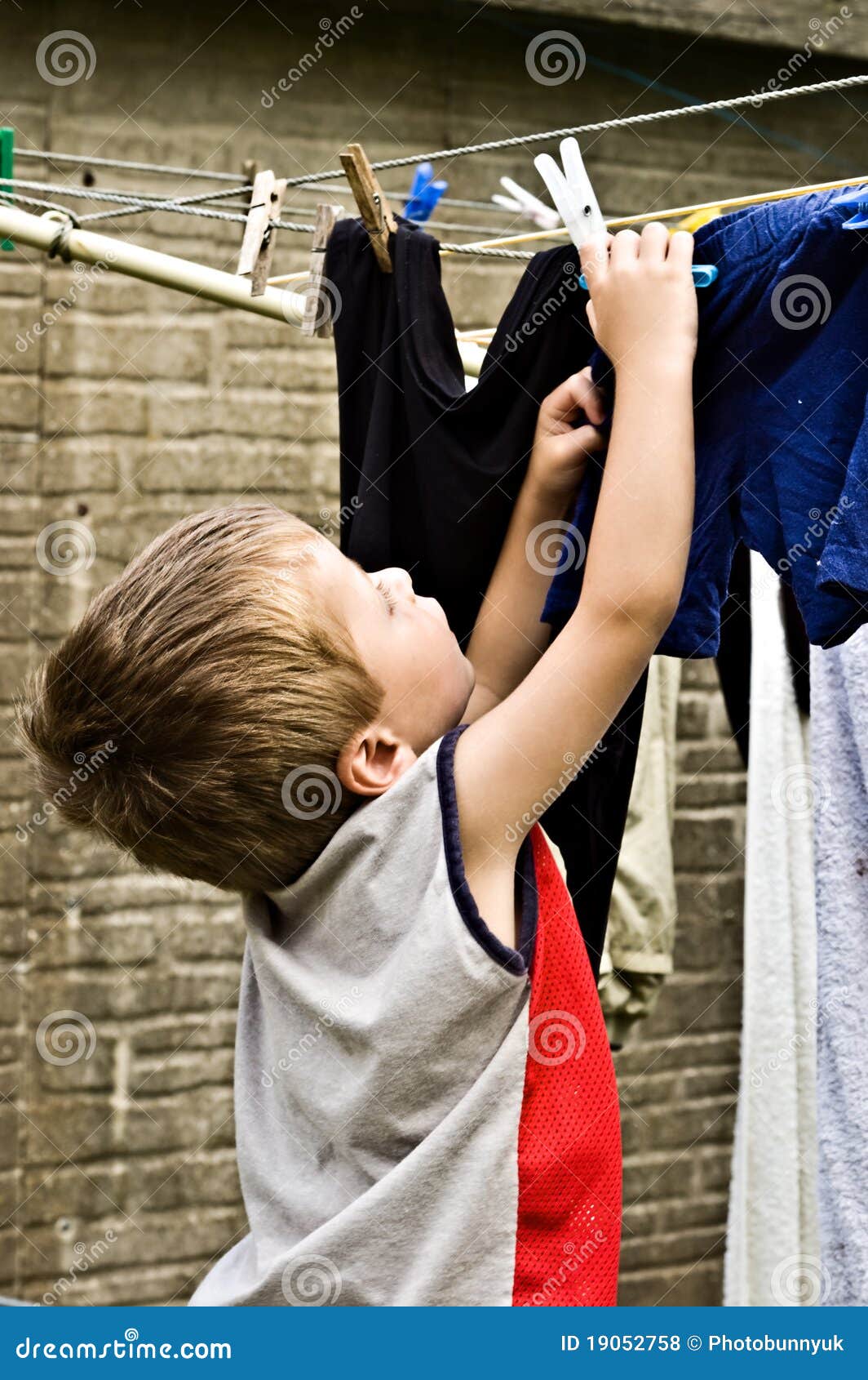 Child helping with washing stock photo. Image of housework - 19052758